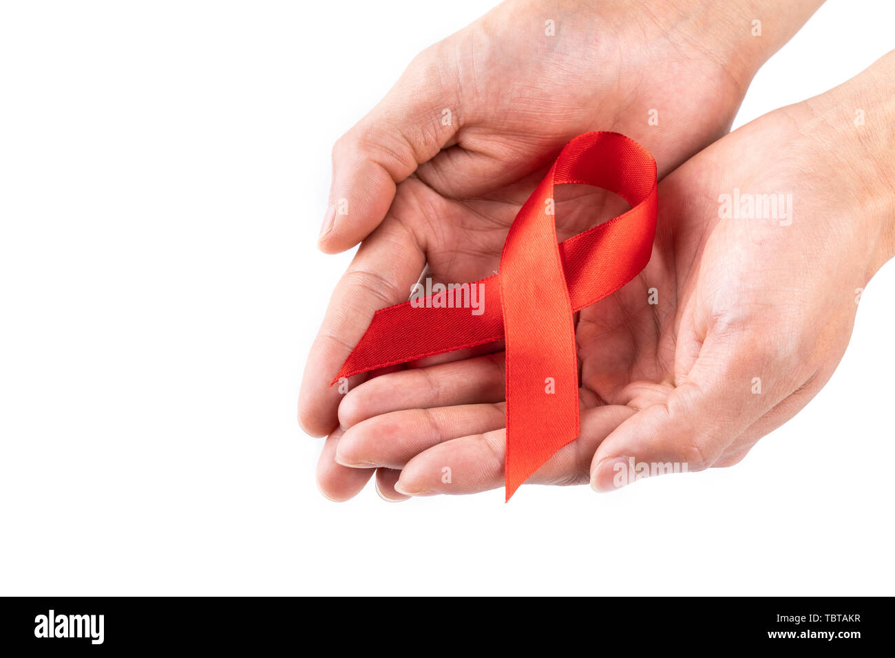 AIDS prevention red ribbon Stock Photo - Alamy