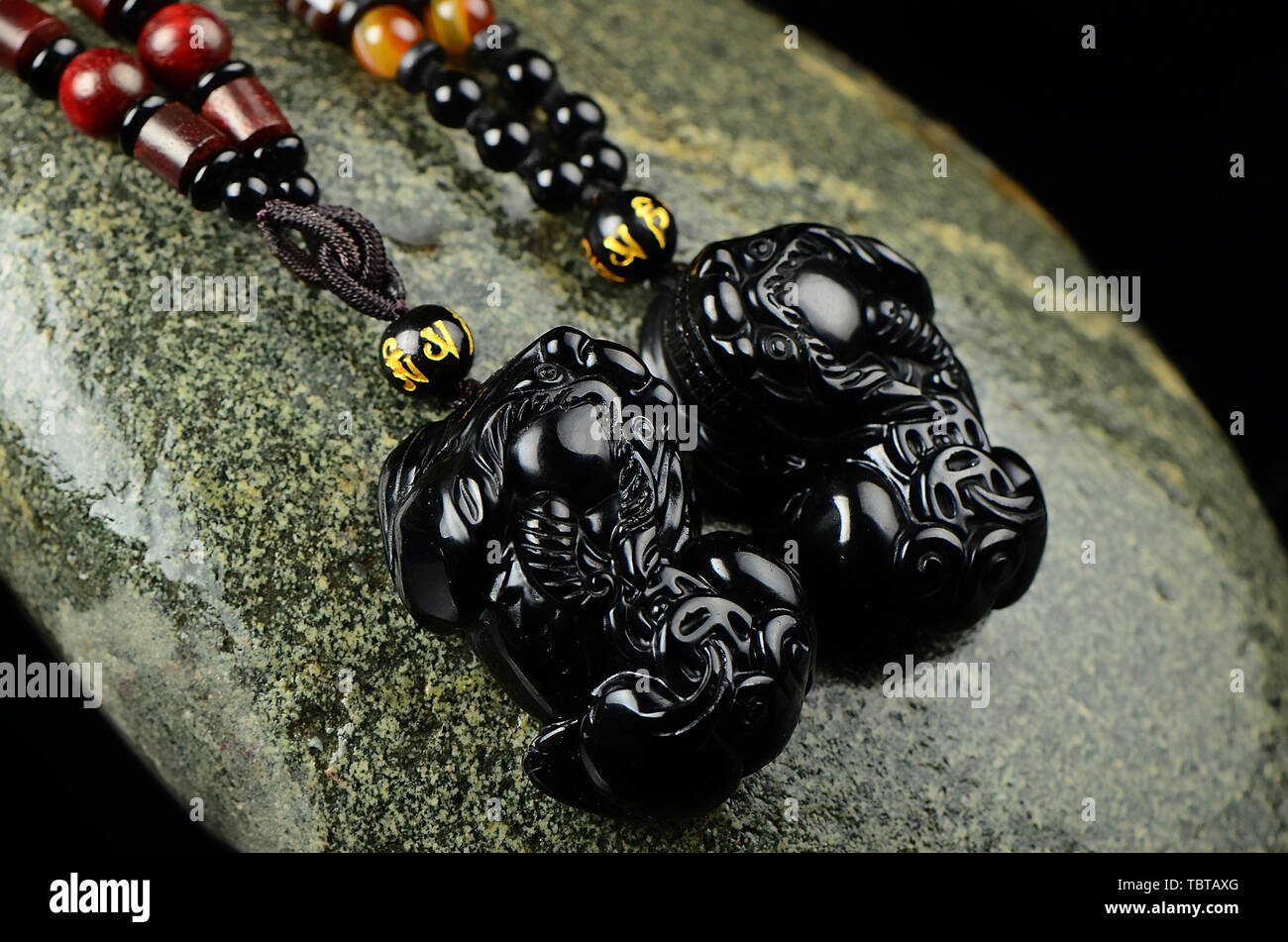 Obsidian Obsidian Pixiu pendant Stock Photo - Alamy