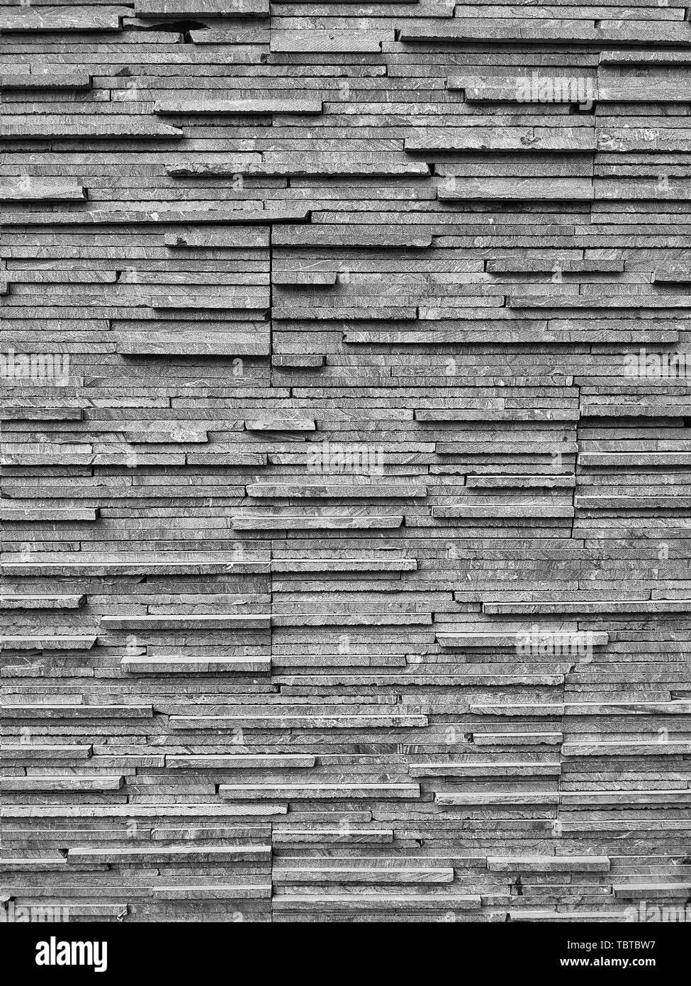 Rough stone wall texture material Stock Photo - Alamy