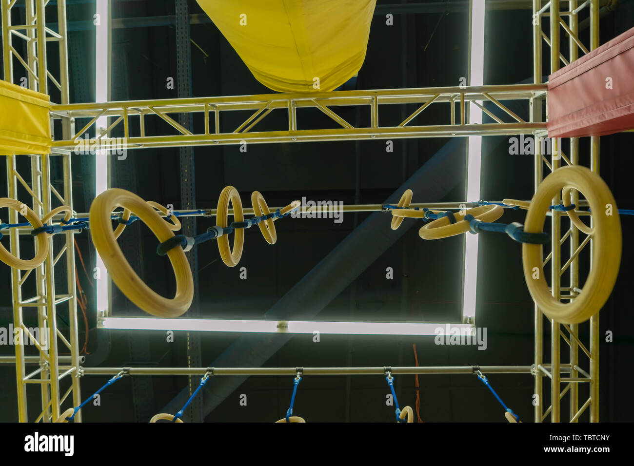 Children's obstacle course. Rings, cylinders and supporting structures ...