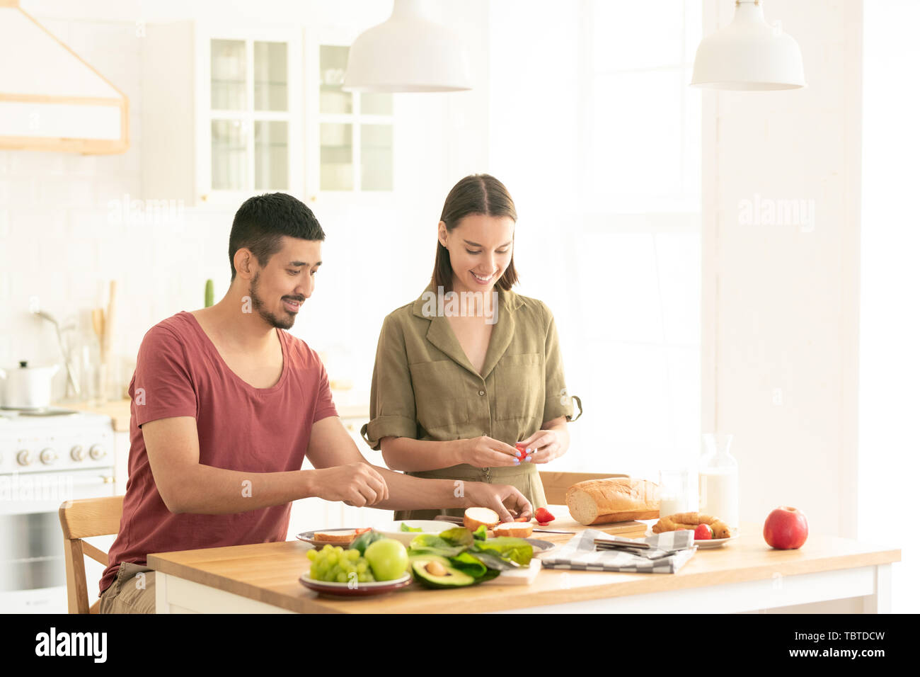 Husband preparing weekend breakfast family hi-res stock photography and ...