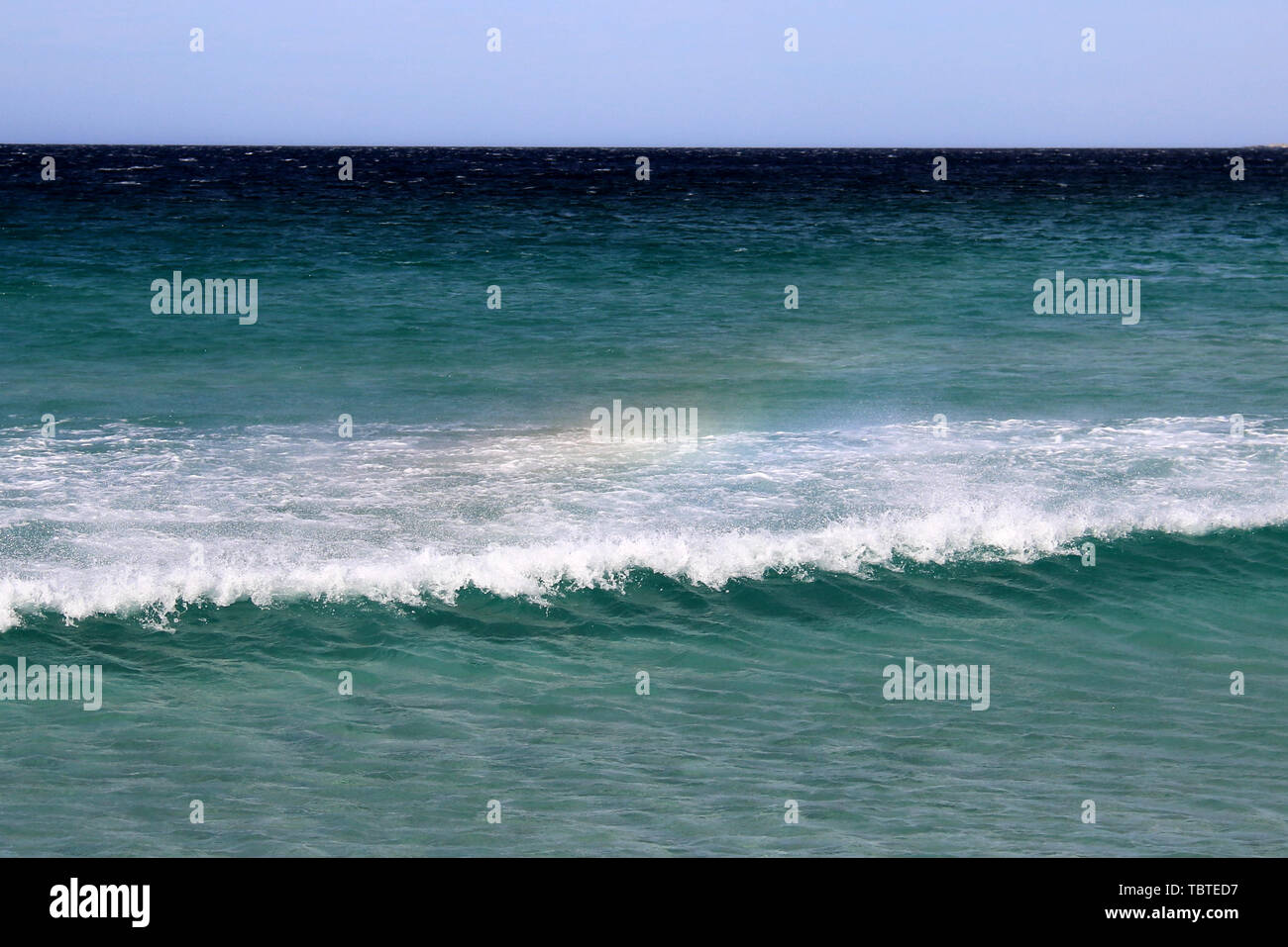 Clear blue ocean churning waves hi-res stock photography and images - Alamy