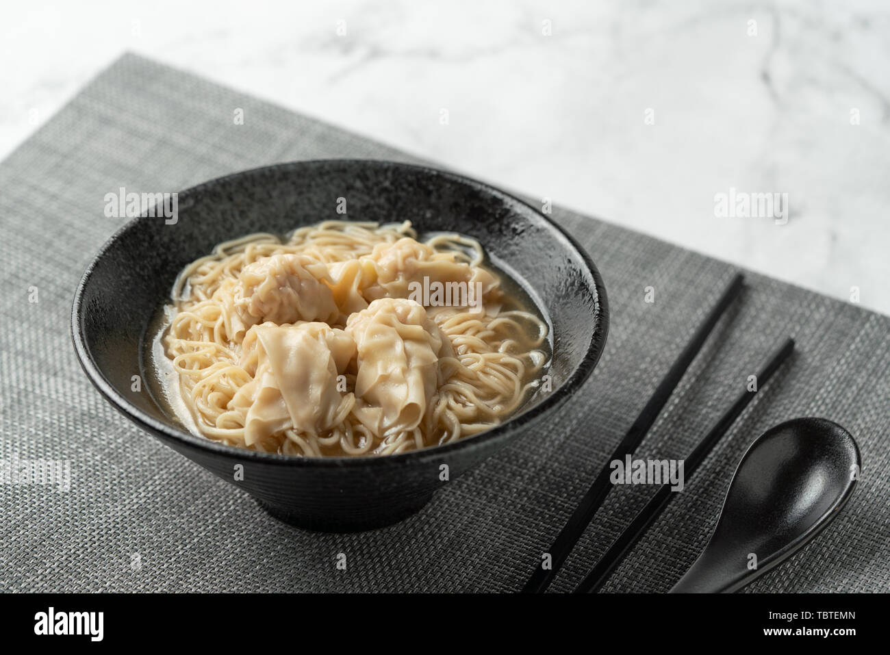 Cloud noodles and utensils on the mat Stock Photo - Alamy