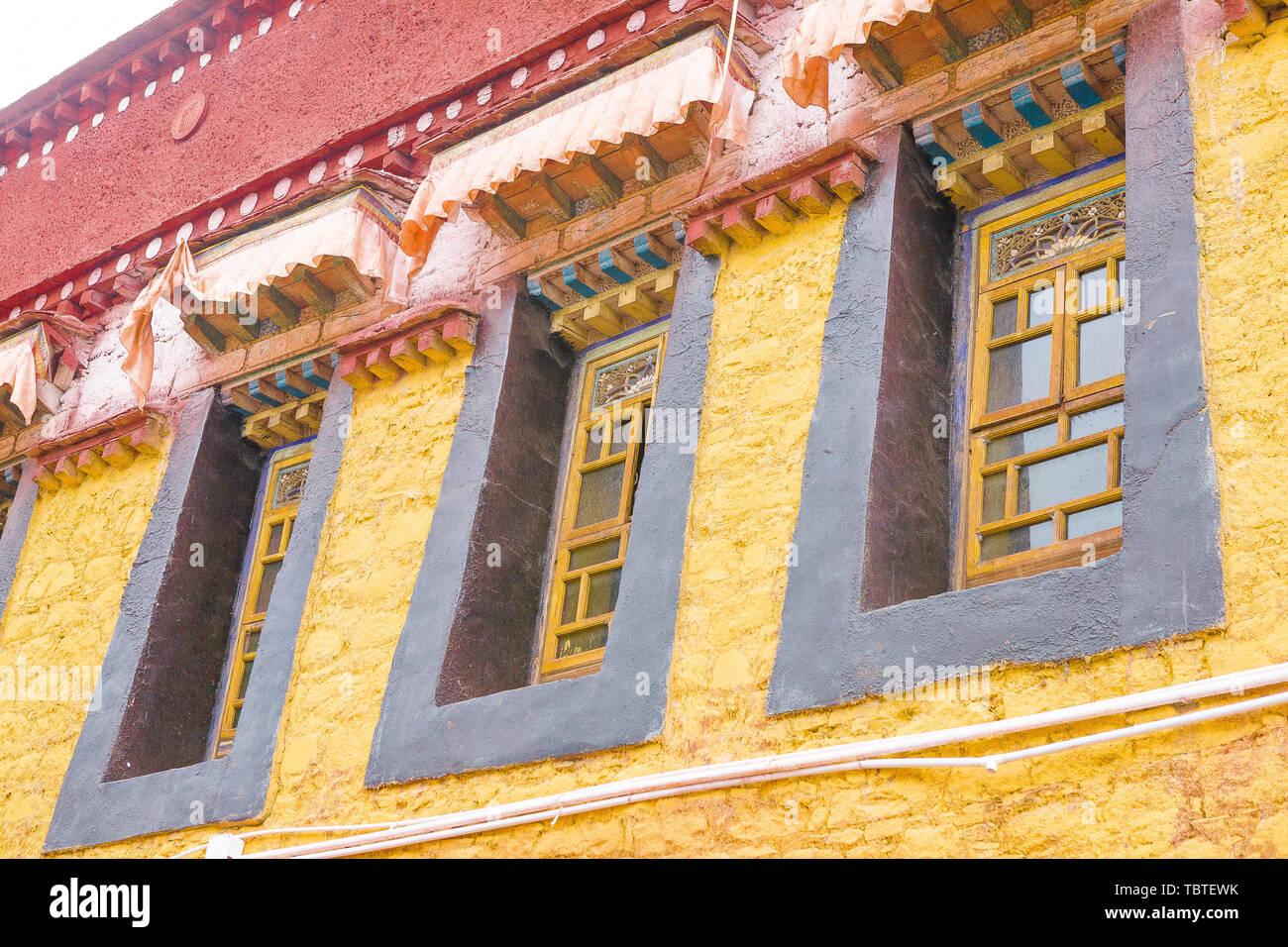 Close-up of windows of Tibetan buildings on Baghor Street in Lhasa ...