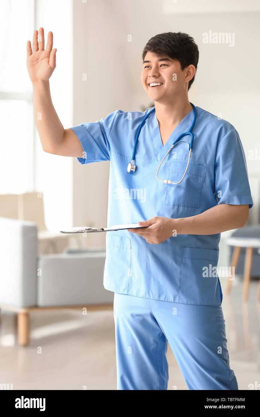 Male medical assistant in clinic Stock Photo - Alamy