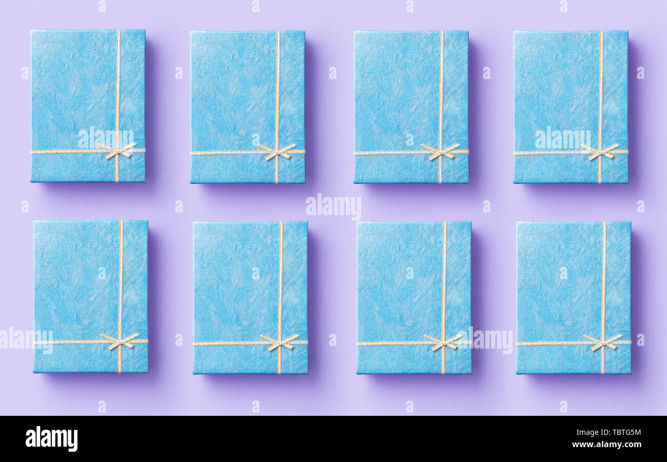 Multiple gift boxes over purple background, top view Stock Photo - Alamy