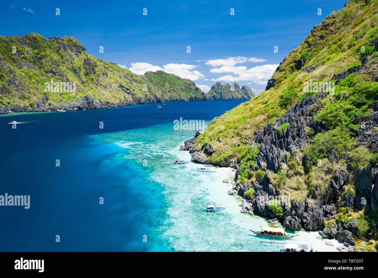 Aerial view of beautiful lagoons and limestone cliffs of El Nido ...