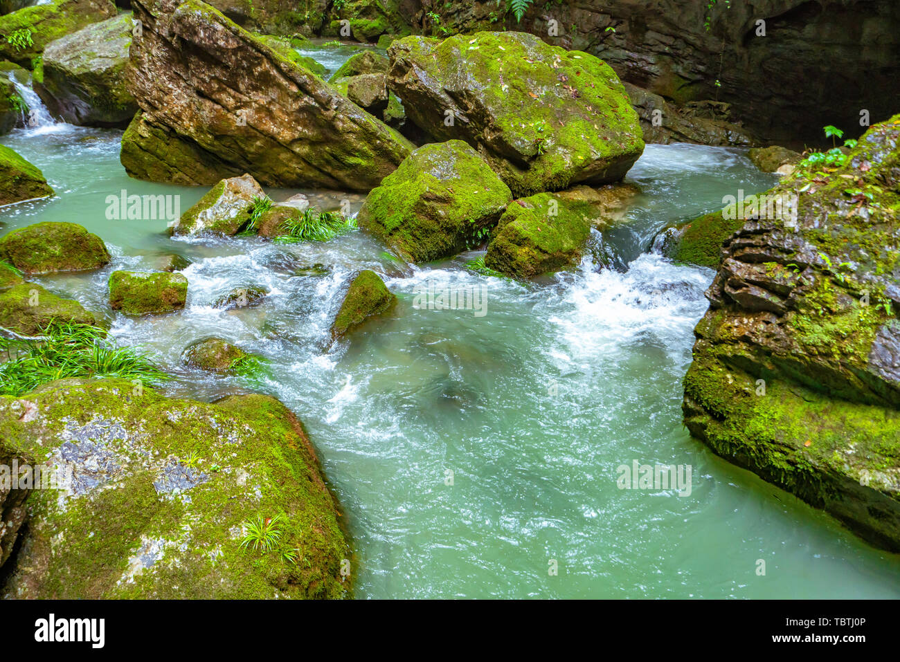 A stream at the seam of the Wulong Long Water Gorge Stock Photo - Alamy
