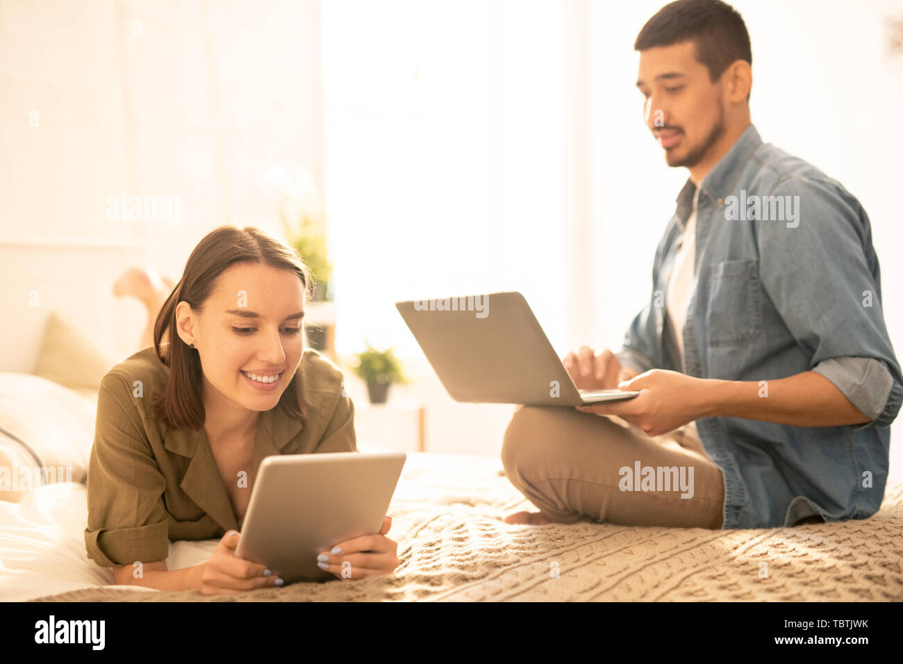 Gadgets family bed hi-res stock photography and images - Alamy