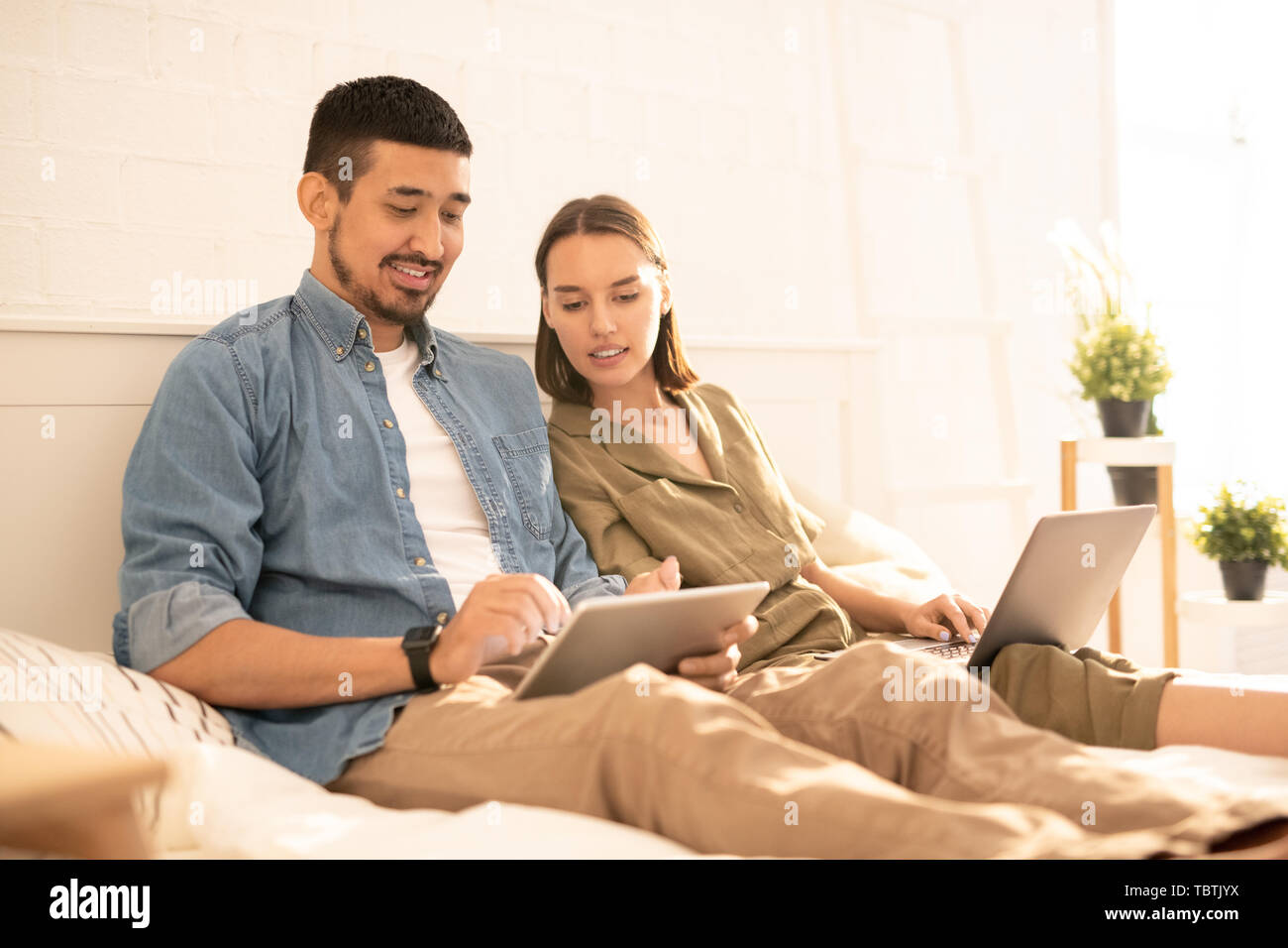 Let us watch something Stock Photo - Alamy