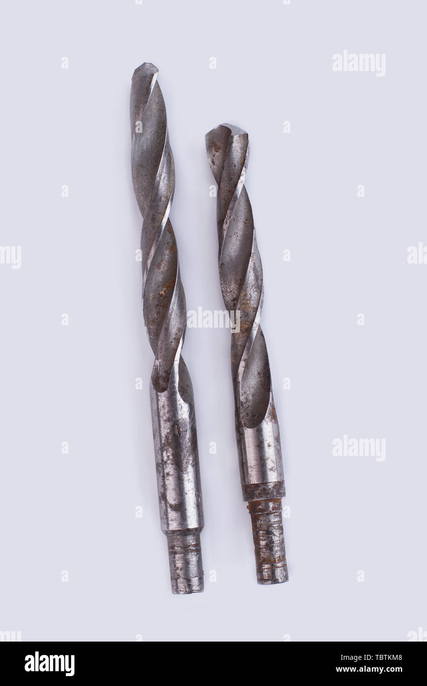 Old drill bits, top view. Used metal tools isolated on white background ...