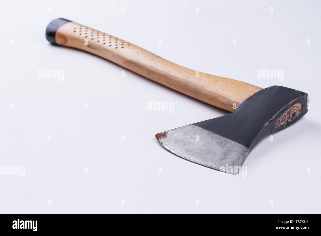 Old axe isolated on white background. Used axe with wooden handle ...