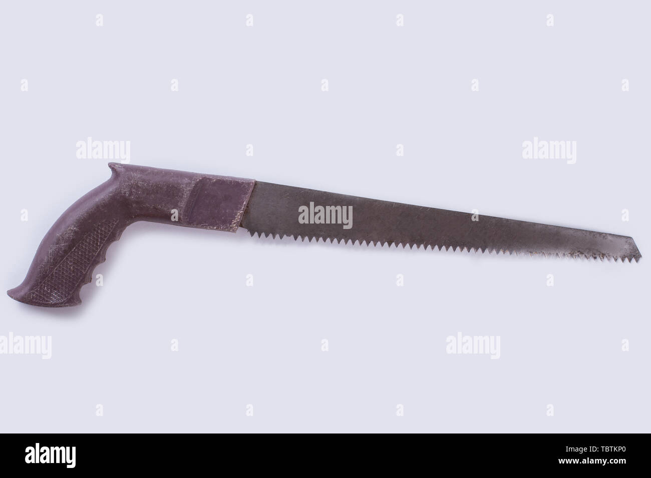 Old rusty hand saw. Wood saw with plastic handle isolated on white ...