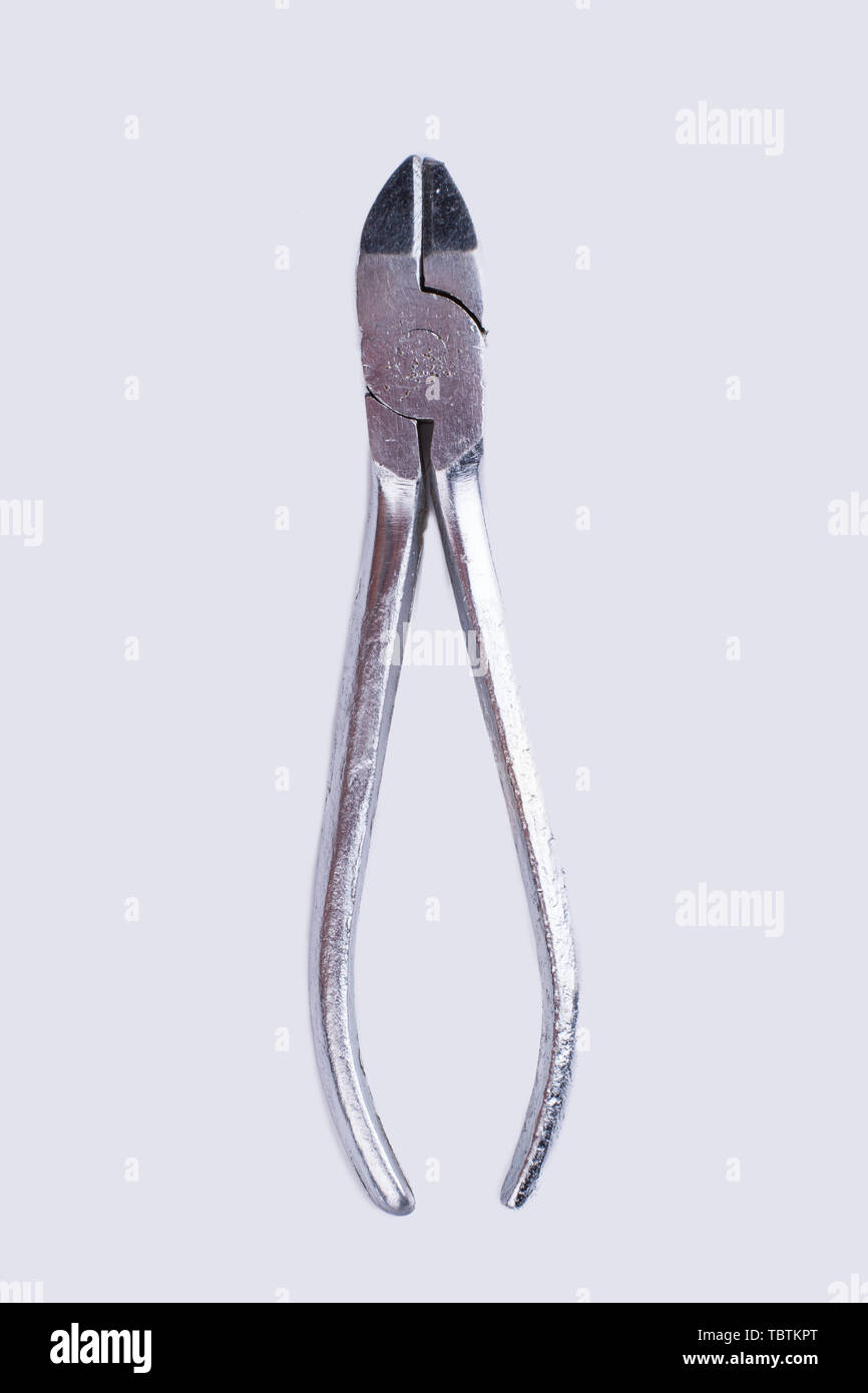 Metal tool isolated on white background. Pair of silver pliers ...
