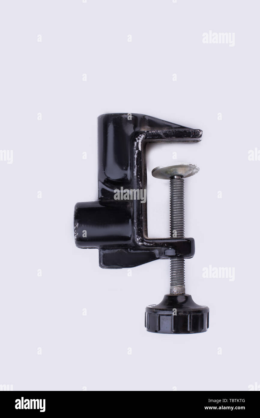 Black G-clamp isolated on white background. Vise clamp, vertical image ...