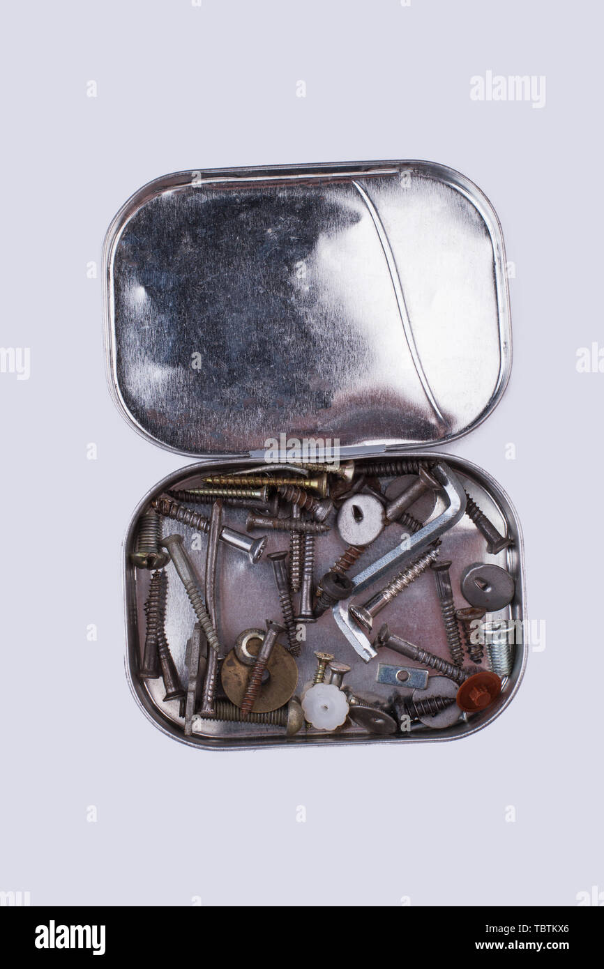 Various screws and nails in metal tool box. Organizer box with ...
