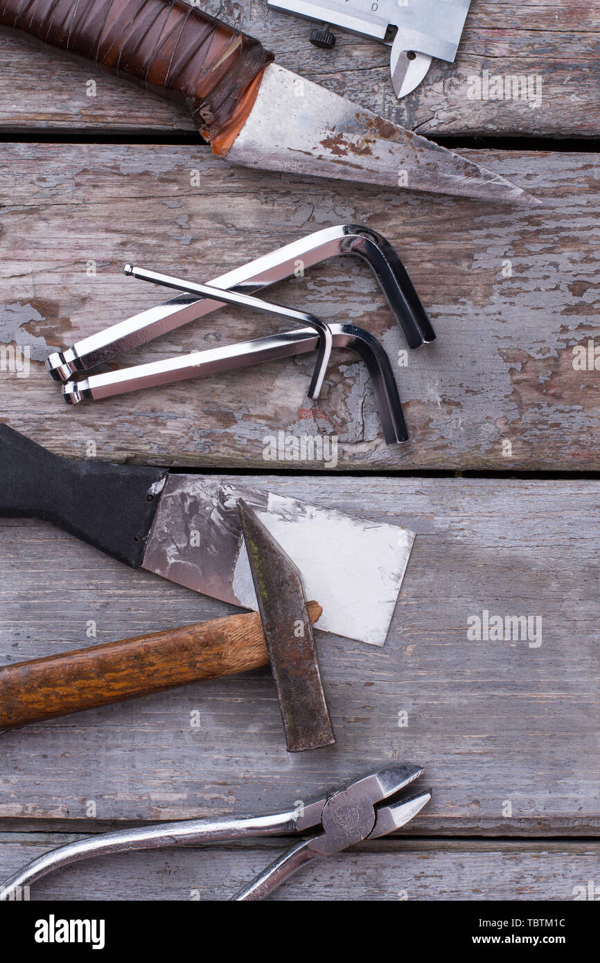 Set of tools and instruments, top view. Old grungy tool set including ...