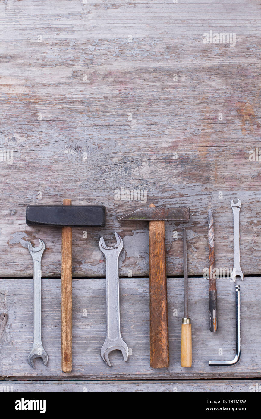 Carpentry tools on old wooden boards. Carpenter working table. Space ...