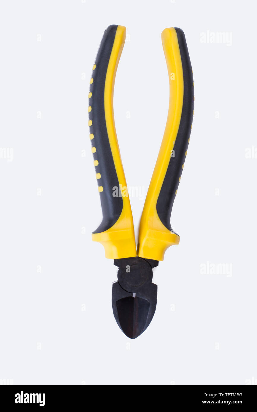 Pliers with yellow handle on white background. Top view metal pliers ...