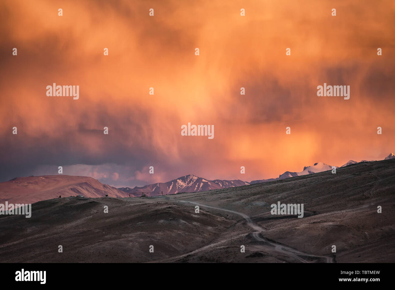 Landscape of the Changtang plateau with a sunset storm clouds in Ladakh ...