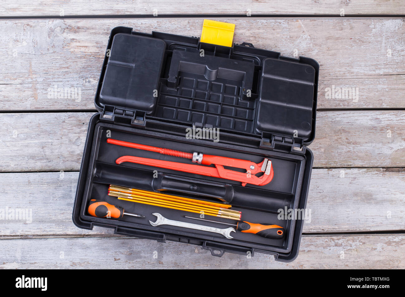 Construction tools in box, top view. Different tools in tool case on ...