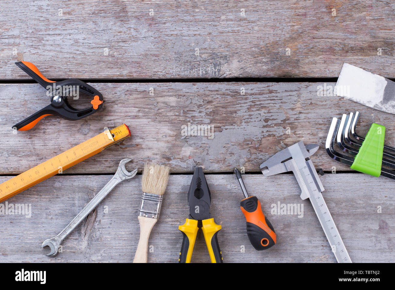 Flat lay carpenter tools on wooden background. Various construction ...