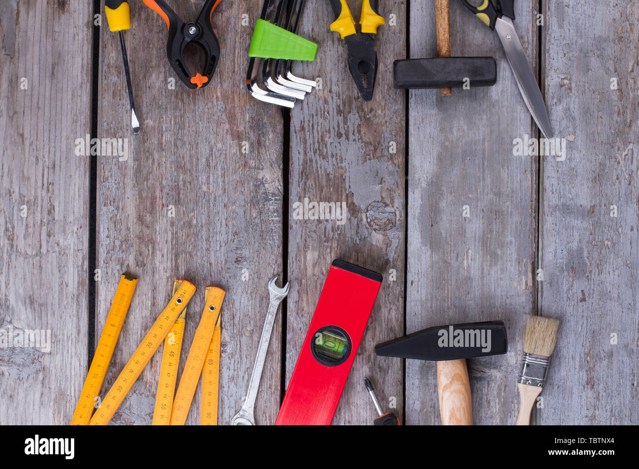 Different construction tools on wooden hi-res stock photography and ...