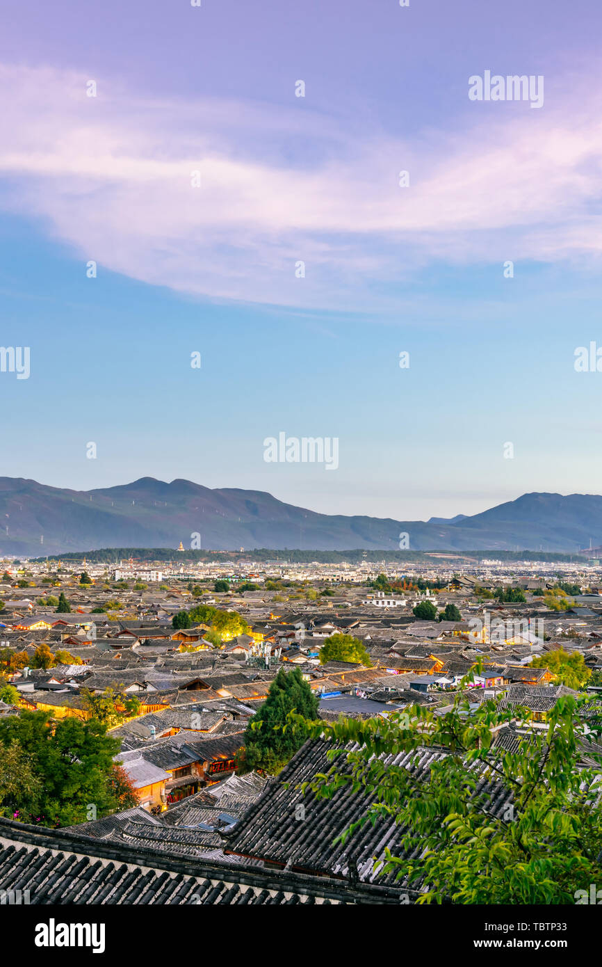 Sunset panorama of the ancient city of Dayan, Lijiang, Yunnan, China ...