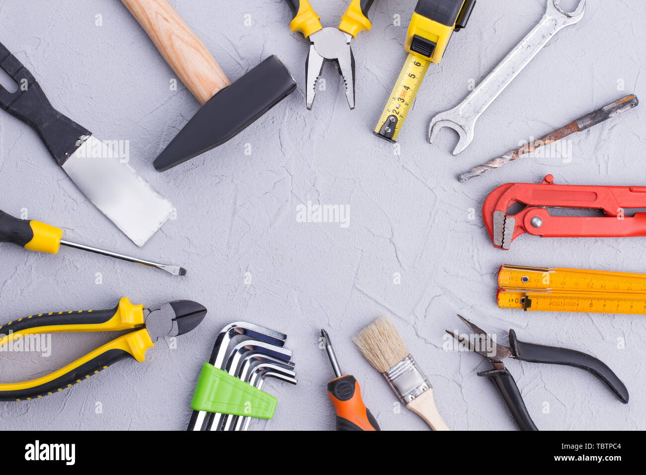 Frame from construction tools on gray background. Flat lay various ...