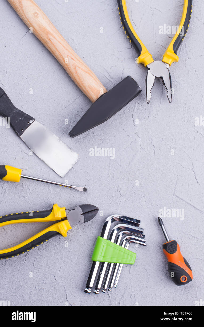 Different construction tools on gray background. Tools for repair. Top ...