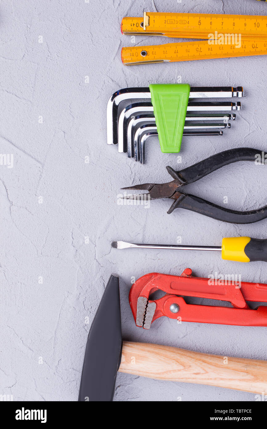 Set of construction tools. Hammer, adjustable wrench, screwdriver ...