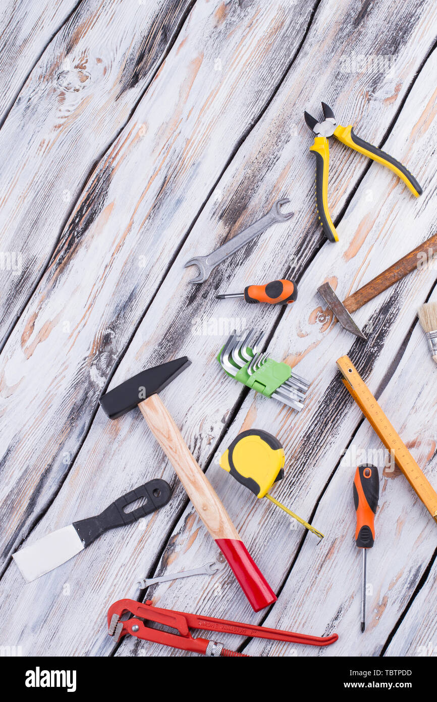 Construction tools on wood background. Flat lay working tool set and ...