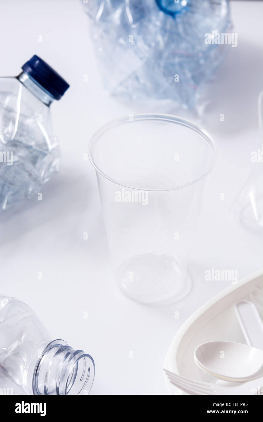 Disposable waste plastic isolated on white background Stock Photo - Alamy