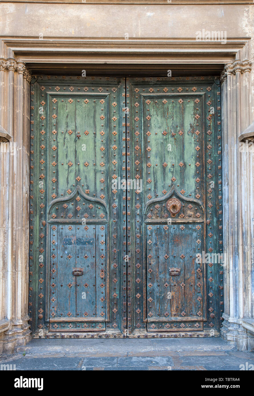 Old massive church door of the catholic church Stock Photo - Alamy