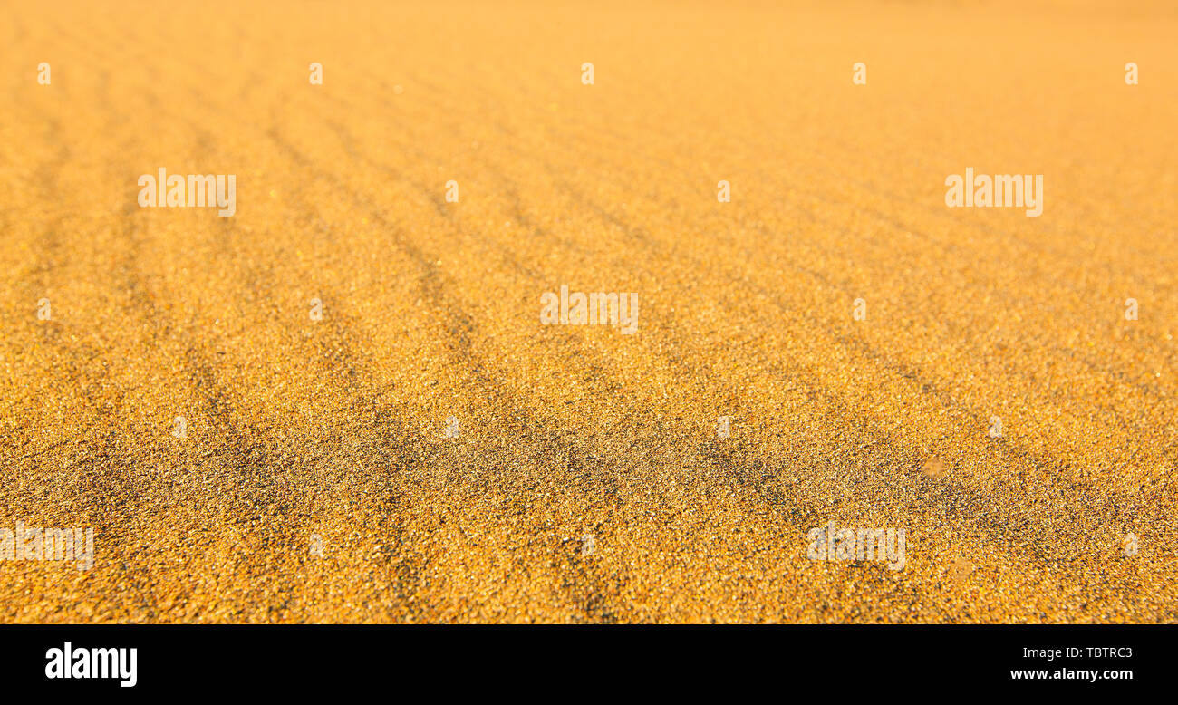 Textured wavy yellow sand all over the frame Stock Photo - Alamy