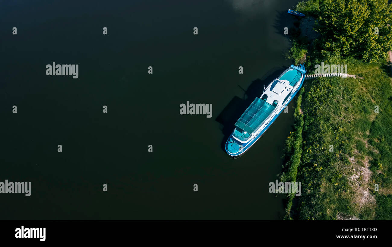yacht near the shore on the river in the Amazon jungle Stock Photo - Alamy