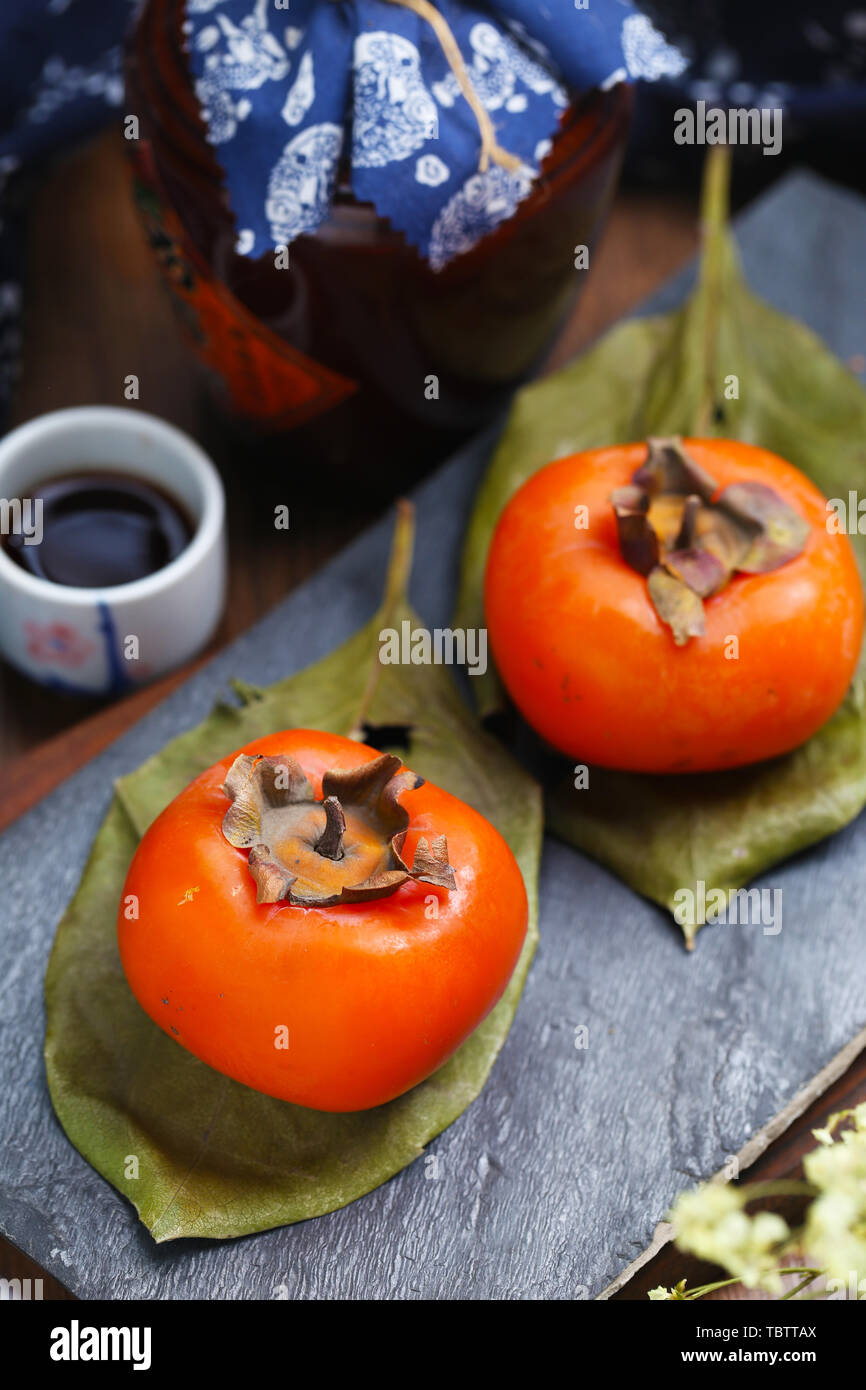 Persimmon stone hi-res stock photography and images - Alamy