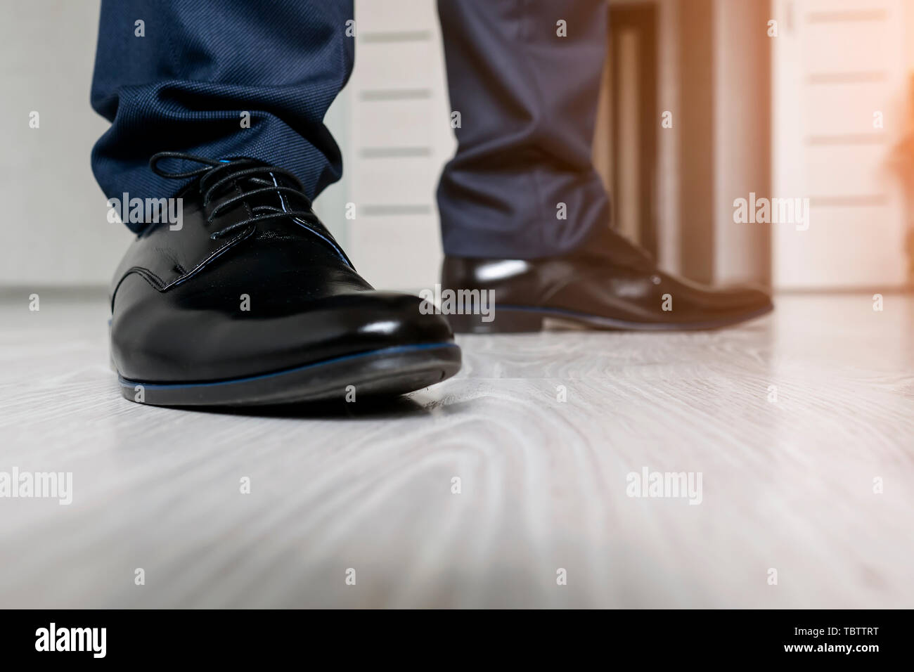 men feet in black shoes close-up Stock Photo - Alamy