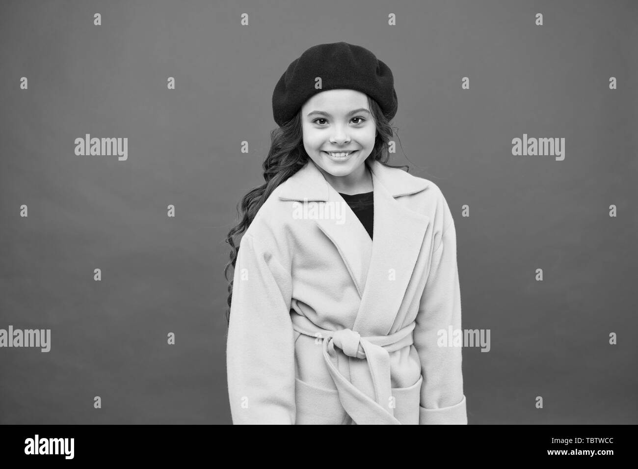 Spring fashion. Kid girl wear coat for spring season. Girl smiling face ...