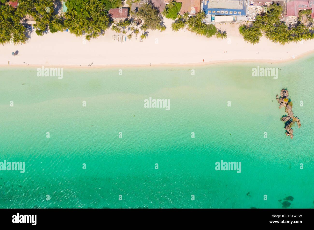 White sand beach and lagoon with turquoise water, aerial view. Coast of ...