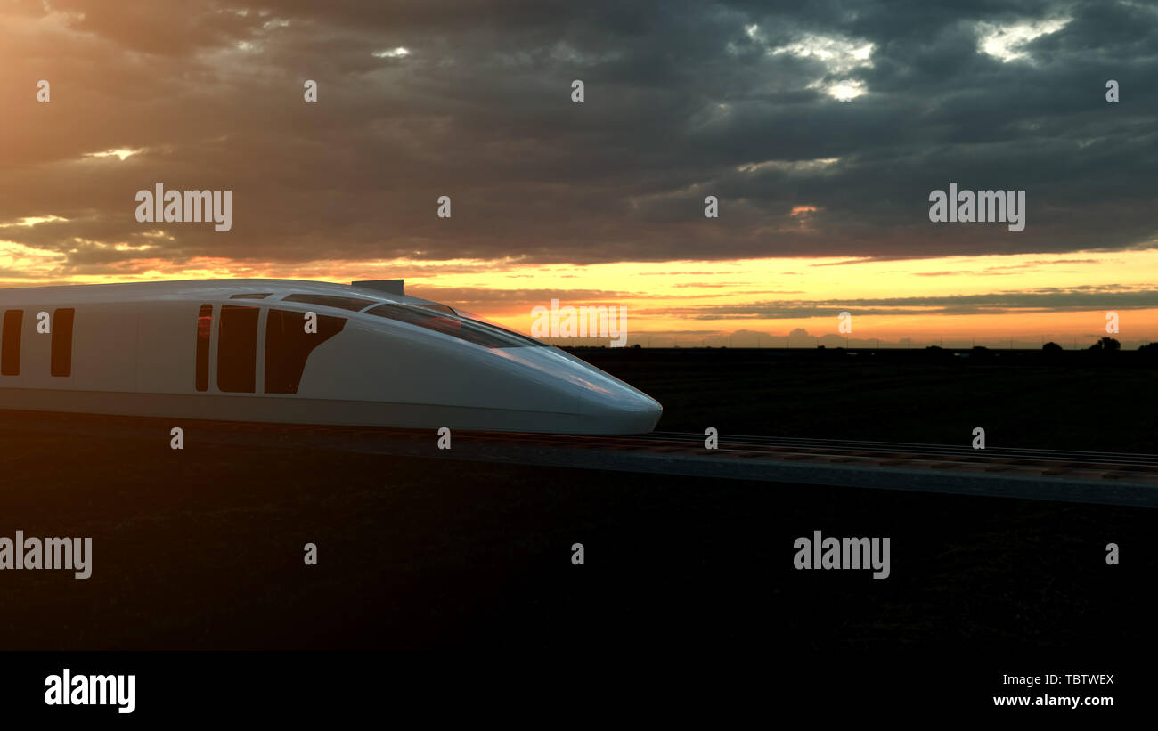 Electric passenger train at sunset backlit by a bright orange sunburst ...