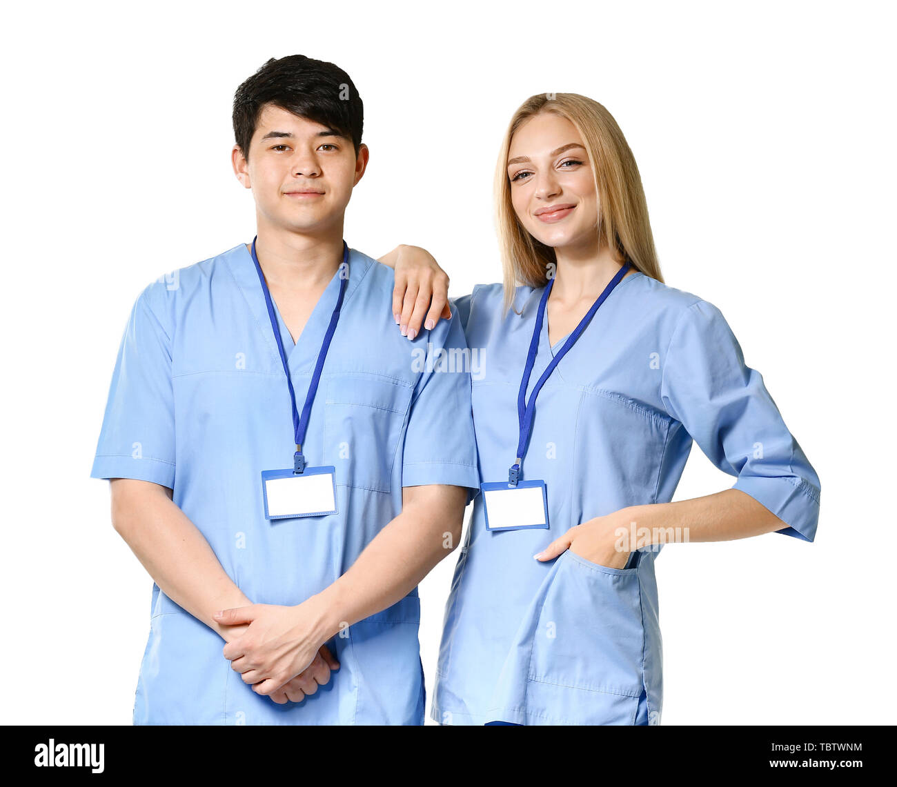 Portrait of medical assistants on white background Stock Photo - Alamy