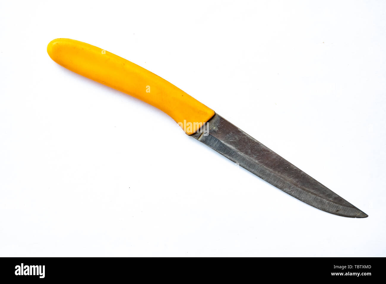 Sharp yellow fruit knife Stock Photo - Alamy
