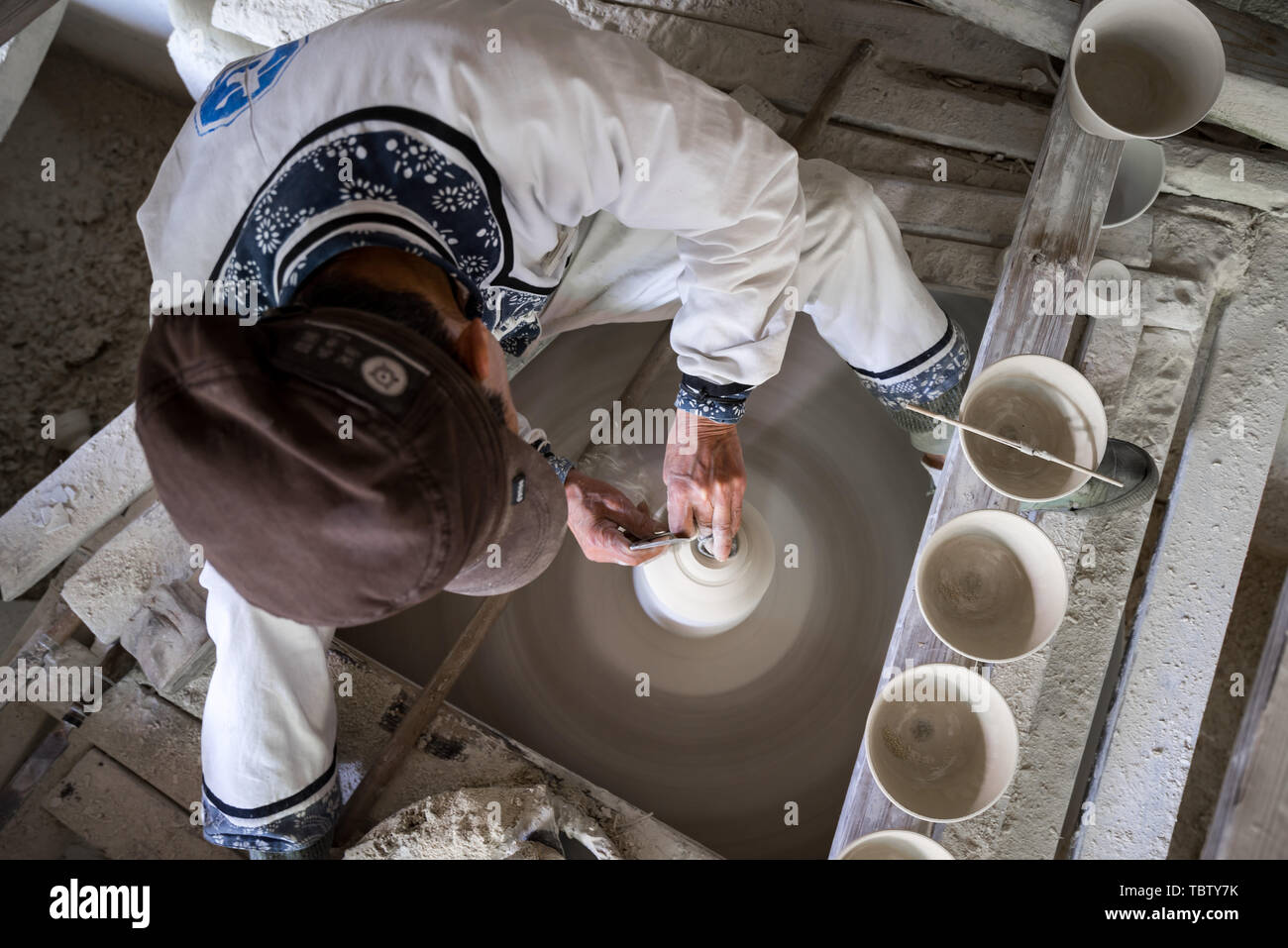 Grinding clay for pottery hi-res stock photography and images - Alamy