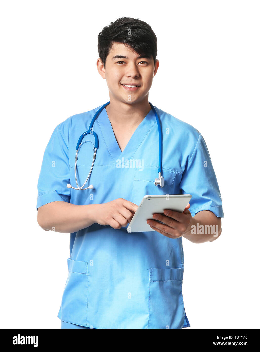 Portrait of male medical assistant with tablet computer on white ...
