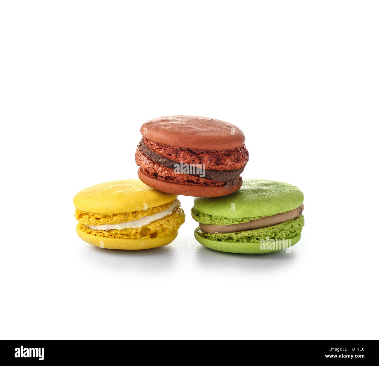 Tasty macarons on white background Stock Photo - Alamy