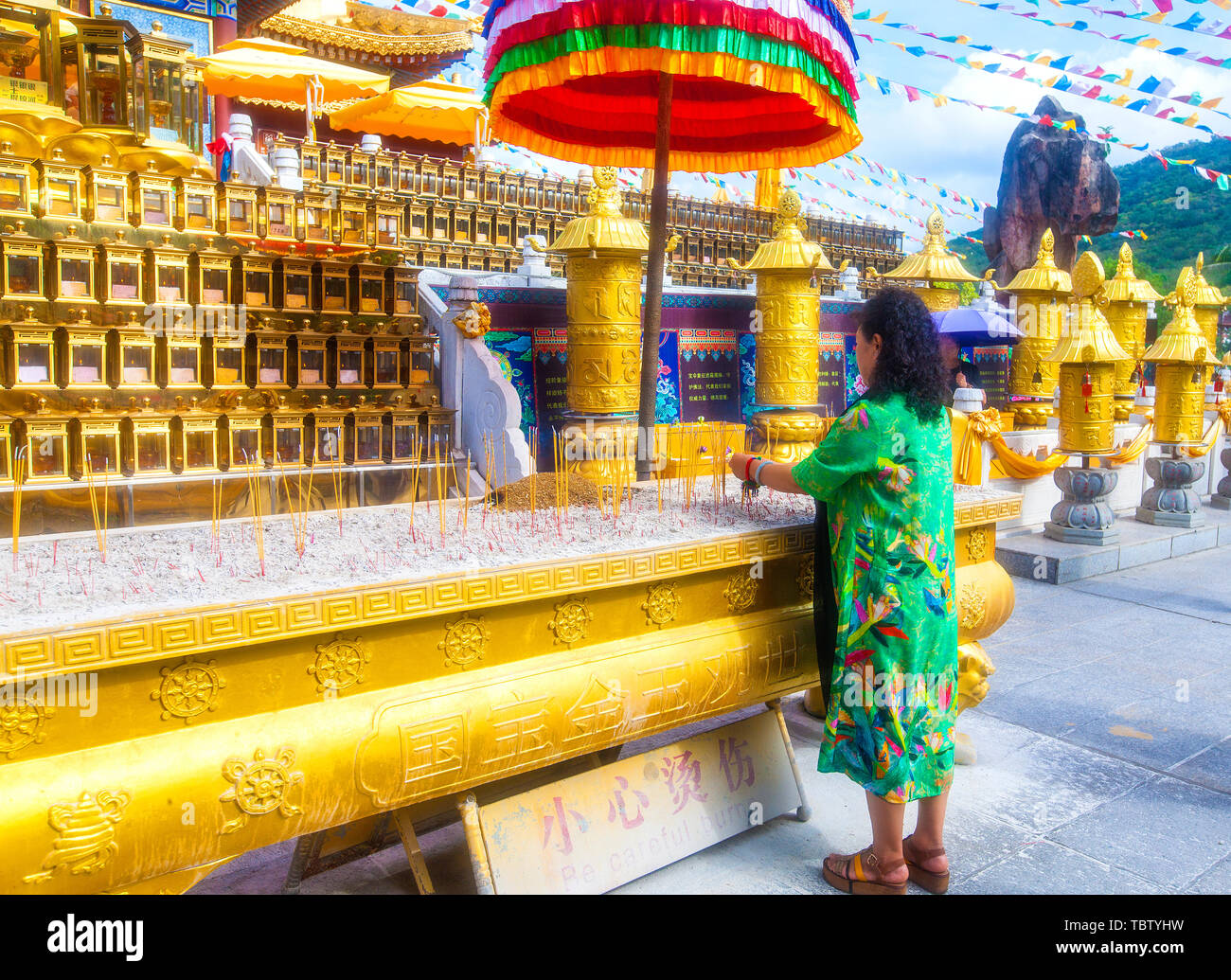 Asian woman prays respect to Chinese buddha in Chinese temple Stock ...