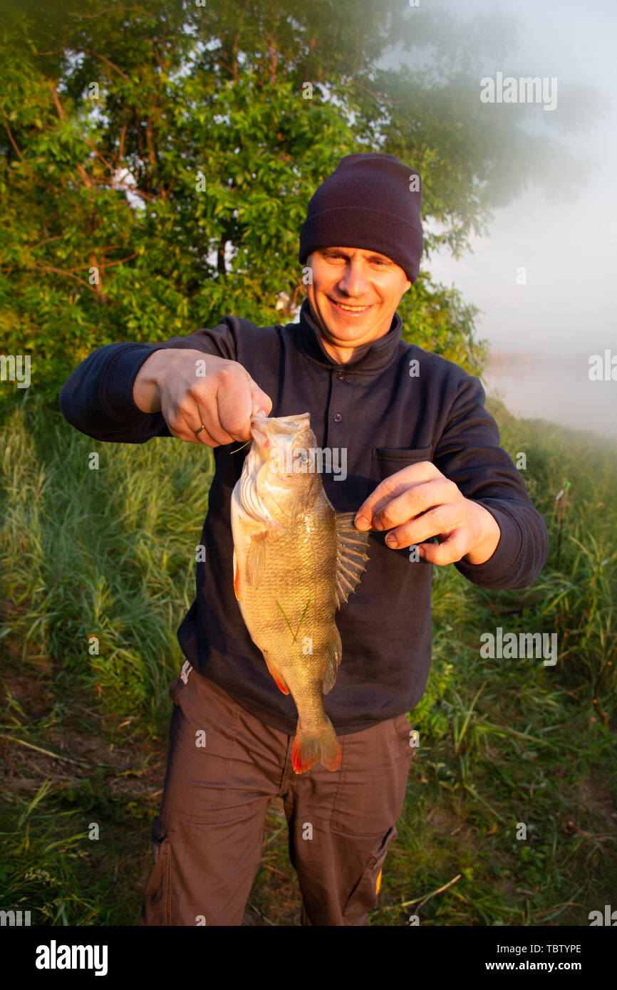 Happy fisherman hi-res stock photography and images - Alamy