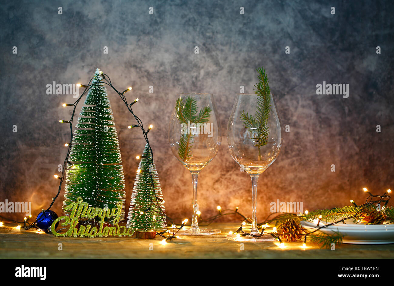 Christmas day scene, Christmas tree and red wine glass Stock Photo - Alamy
