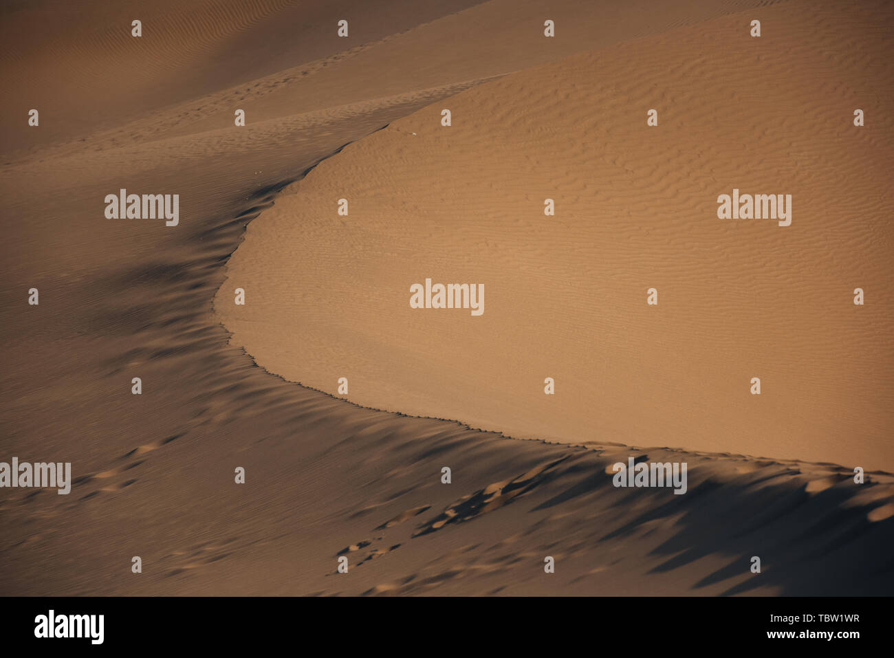 Smooth dunes and desert surfaces Stock Photo - Alamy